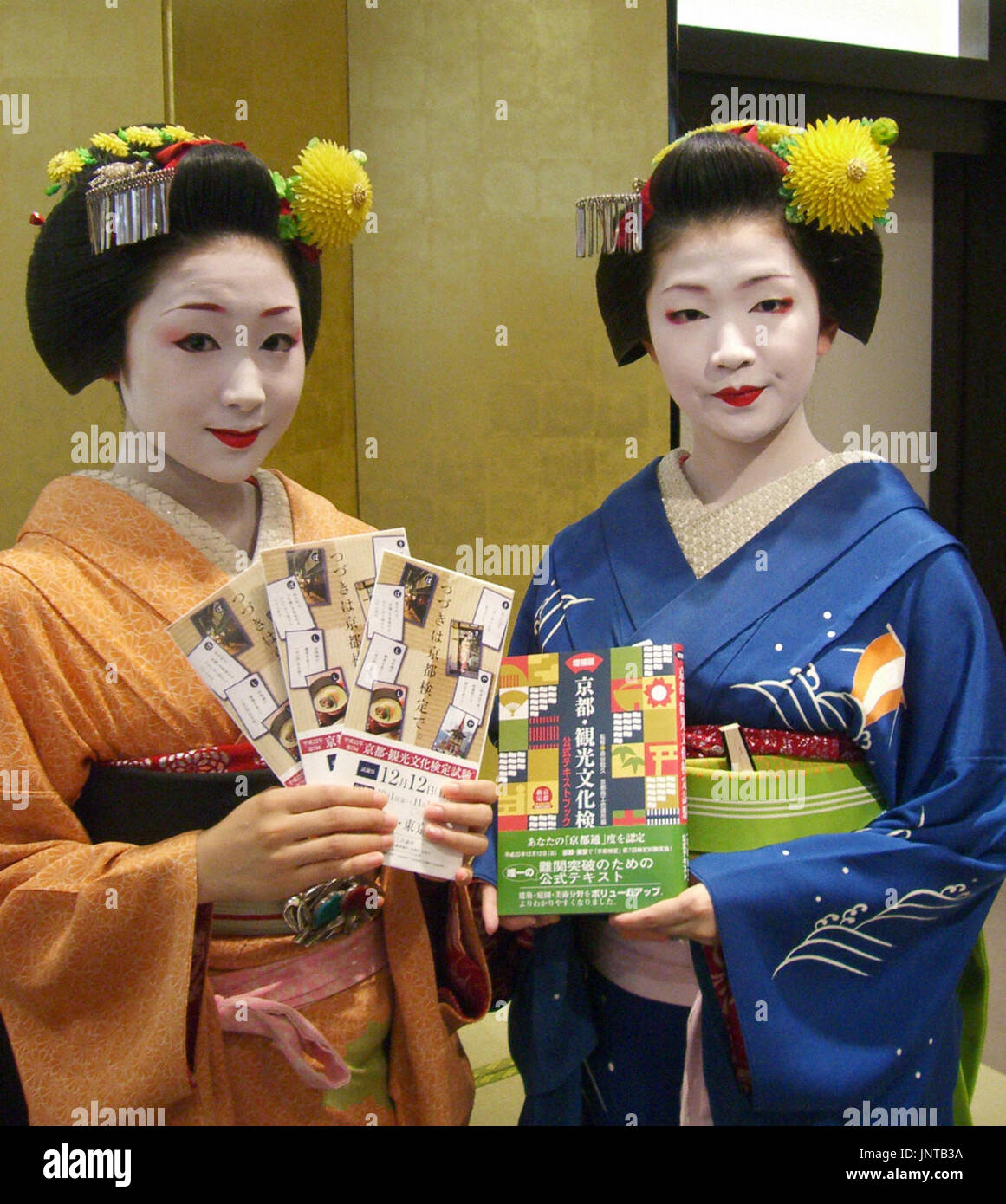 KYOTO, Japan - Two ''maiko'' apprentice geisha show off application ...