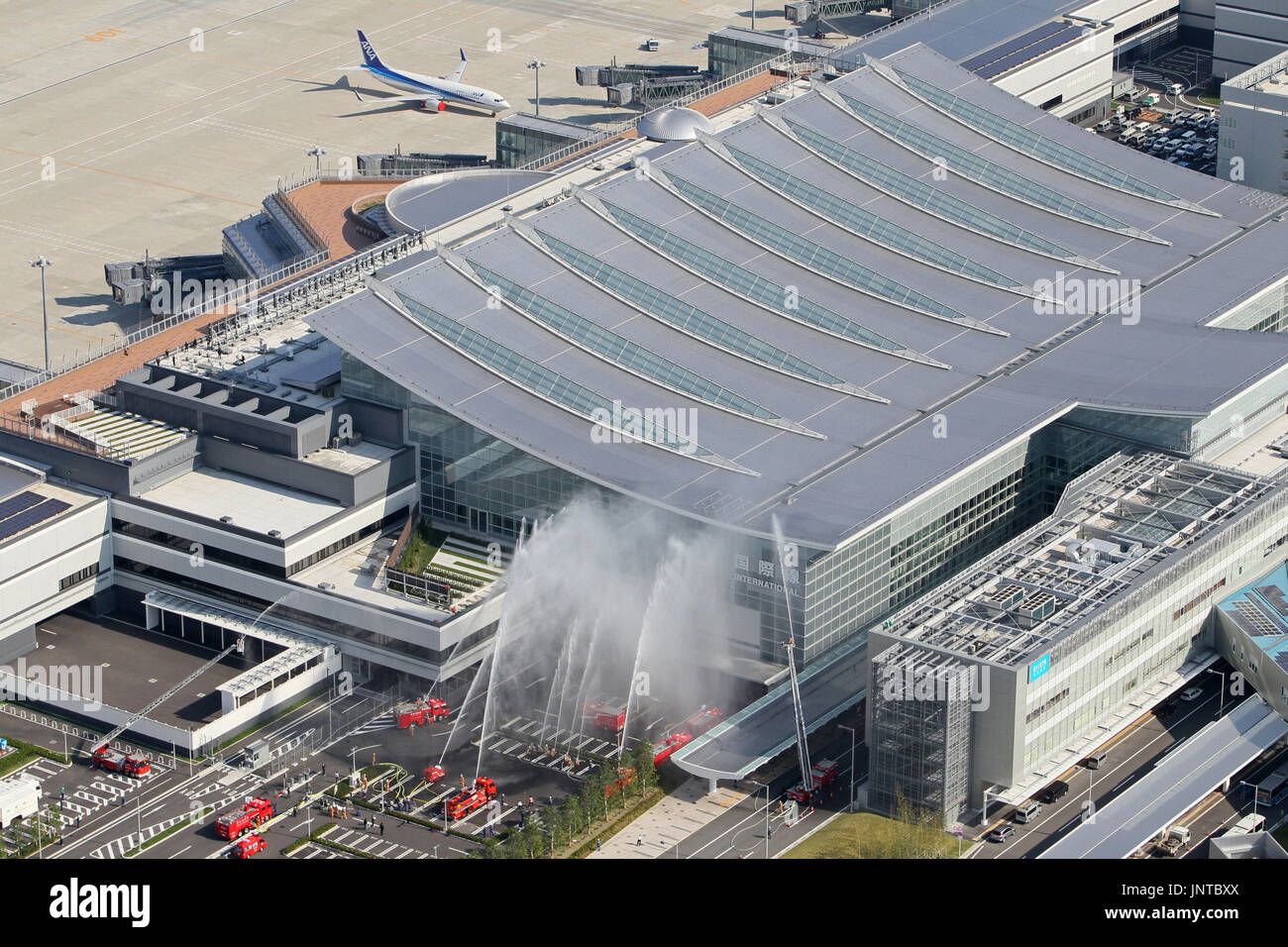 TOKYO, Japan - A fire fighting drill is conducted at a new ...