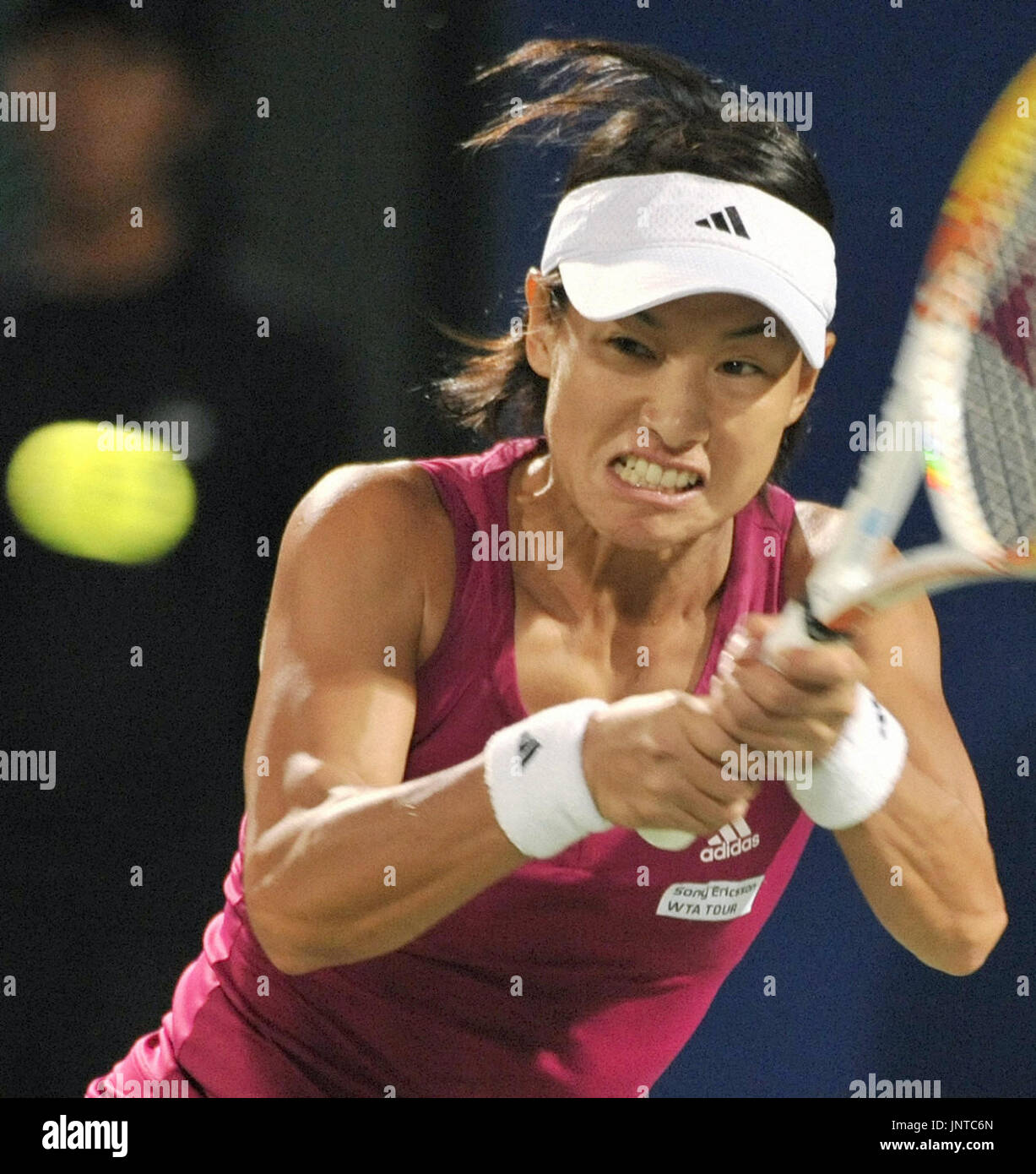 OSAKA, Japan - Kimiko Date Krumm returns the ball to Aiko Nakamura in a ...