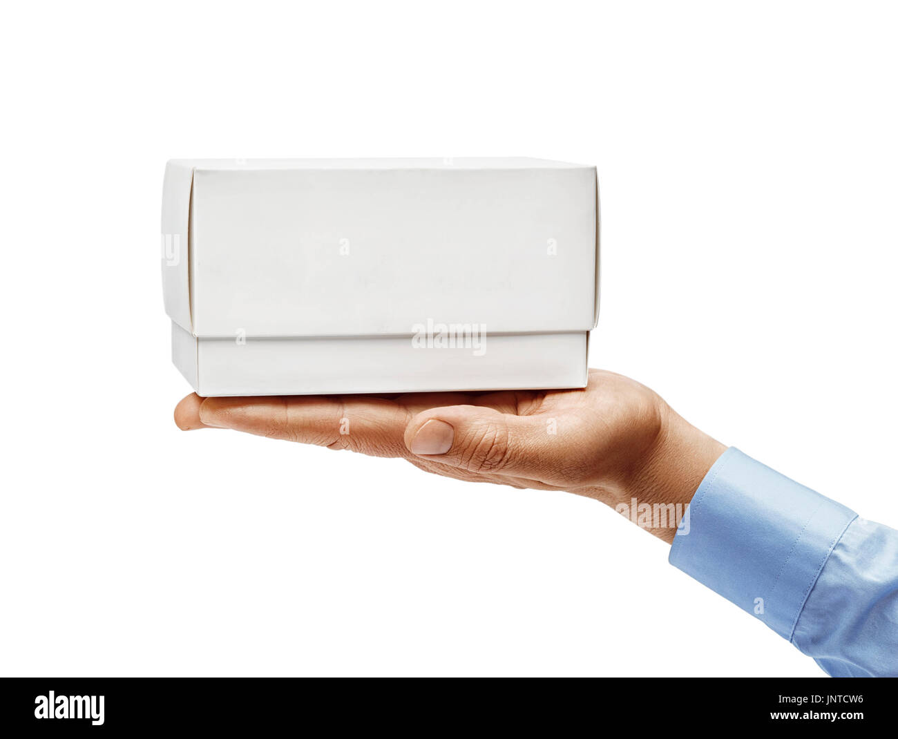 Man's hand in a shirt holding white box isolated on white background ...