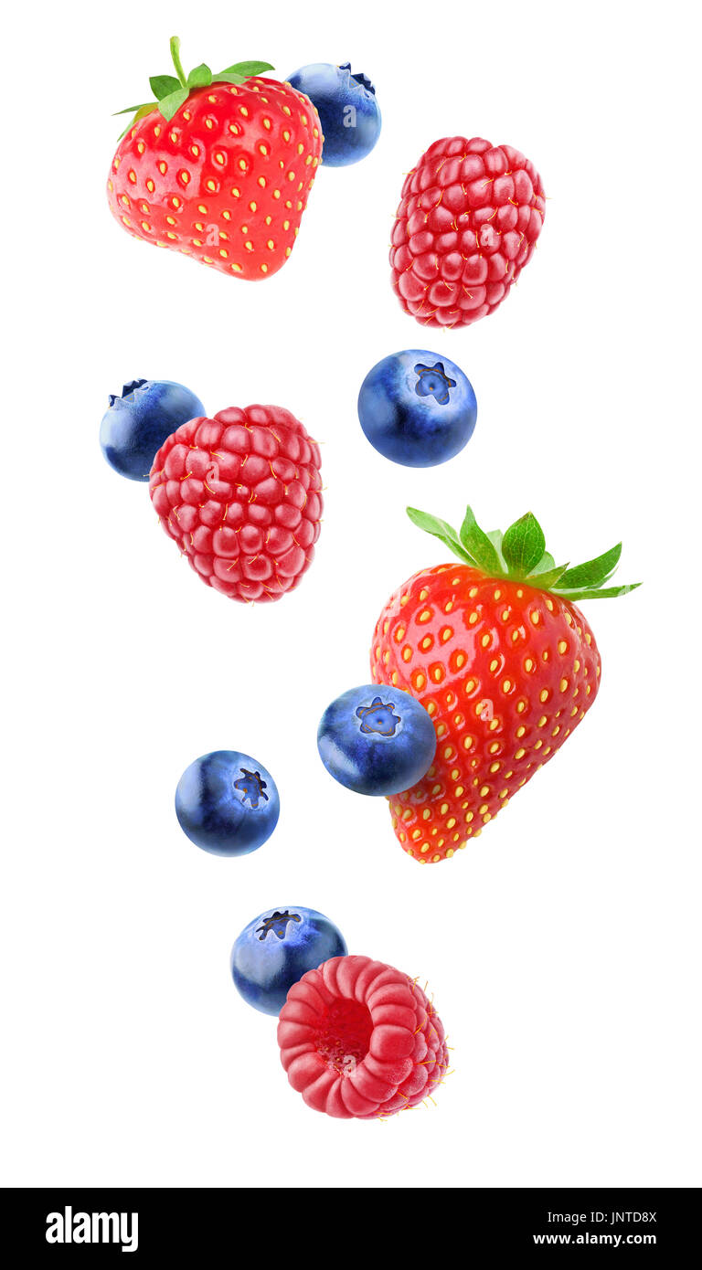 Isolated berries in the air. Falling strawberry, raspberry and ...