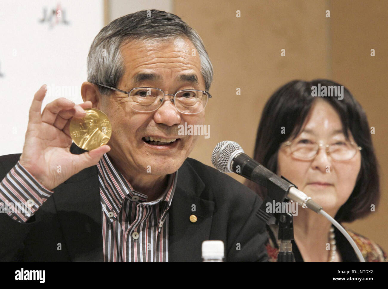 NARITA, Japan - Nobel Prize winner in chemistry Eiichi Negishi (L ...