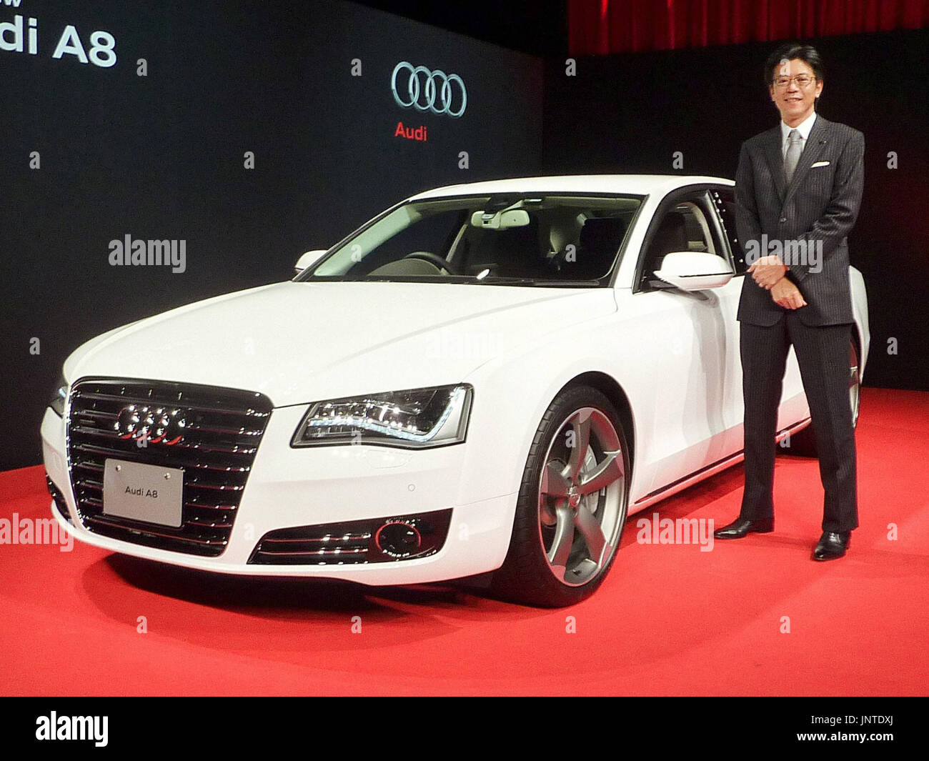TOKYO, Japan - Audi Japan K.K. President Hiroshi Okita unveils a new ...