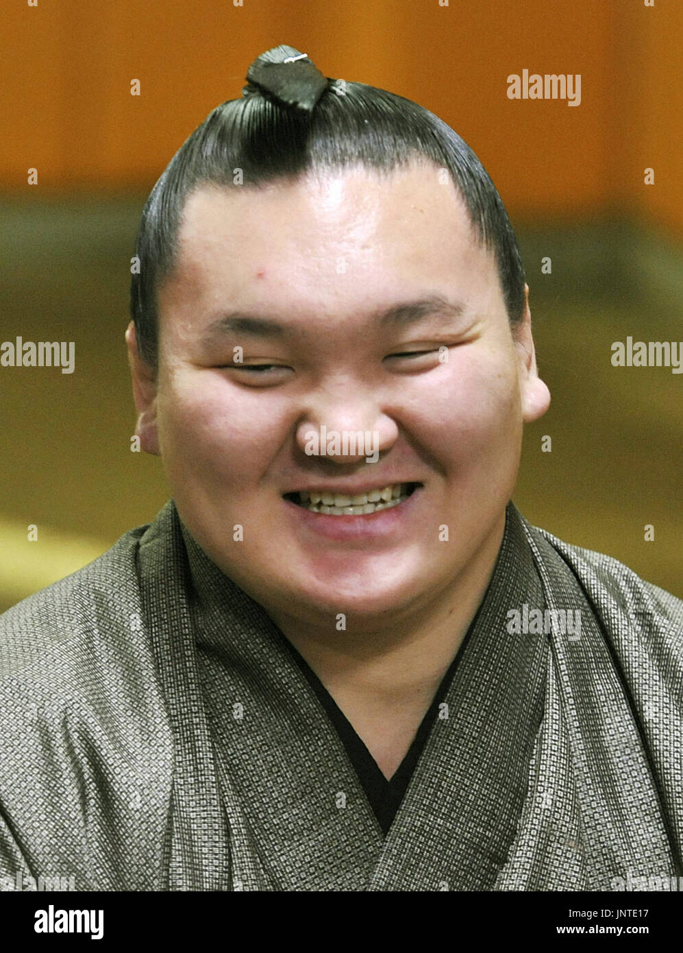 TOKYO, Japan - Grand champion Hakuho smiles during a press conference ...