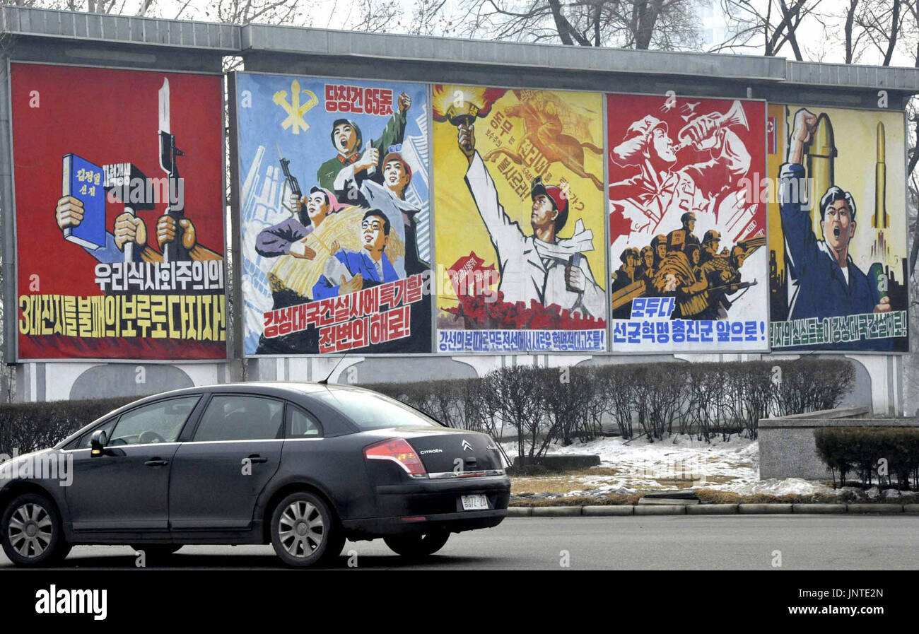 PYONGYANG, North Korea - Billboards display propaganda signs hailing ...