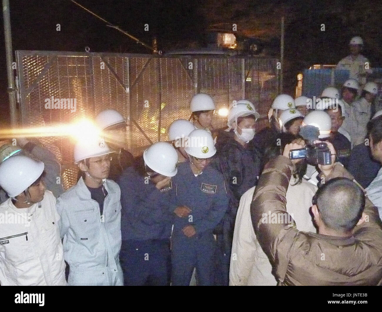 NAHA, Japan - Workers blockade an area near a planned U.S. helipad ...