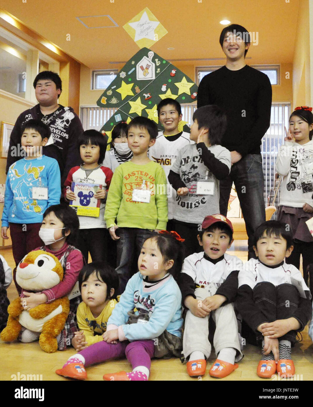 SENDAI, Japan - Rakuten Eagles pitcher Hisashi Iwakuma poses for photos ...