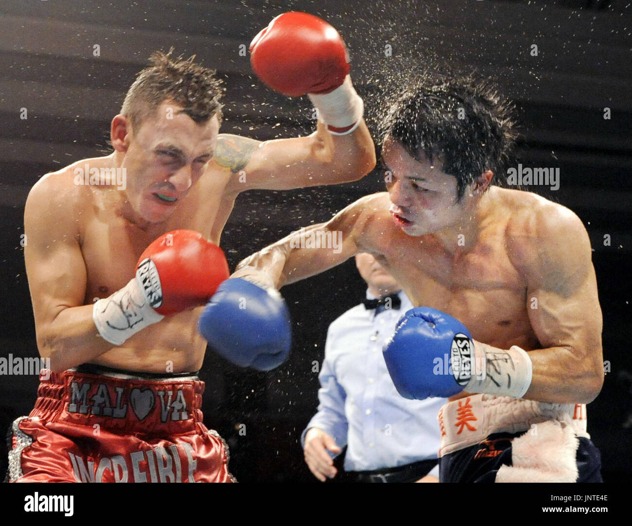 OSAKA, Japan - Japanese challenger Hiroyuki Hisataka (R) and Hugo ...