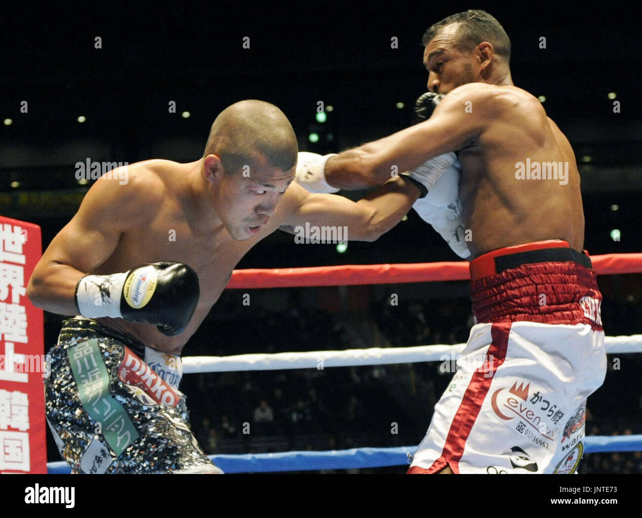 SAITAMA, Japan - Koki Kameda (L) of Japan hits Alexander Munoz of ...