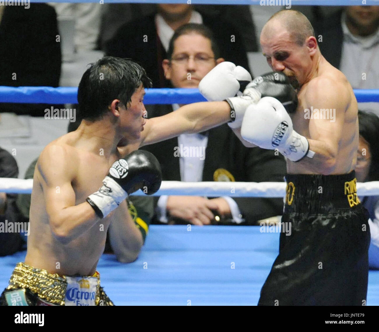 SAITAMA, Japan - WBA flyweight champion Daiki Kameda of Japan hits challenger Silvio Olteanu of ...