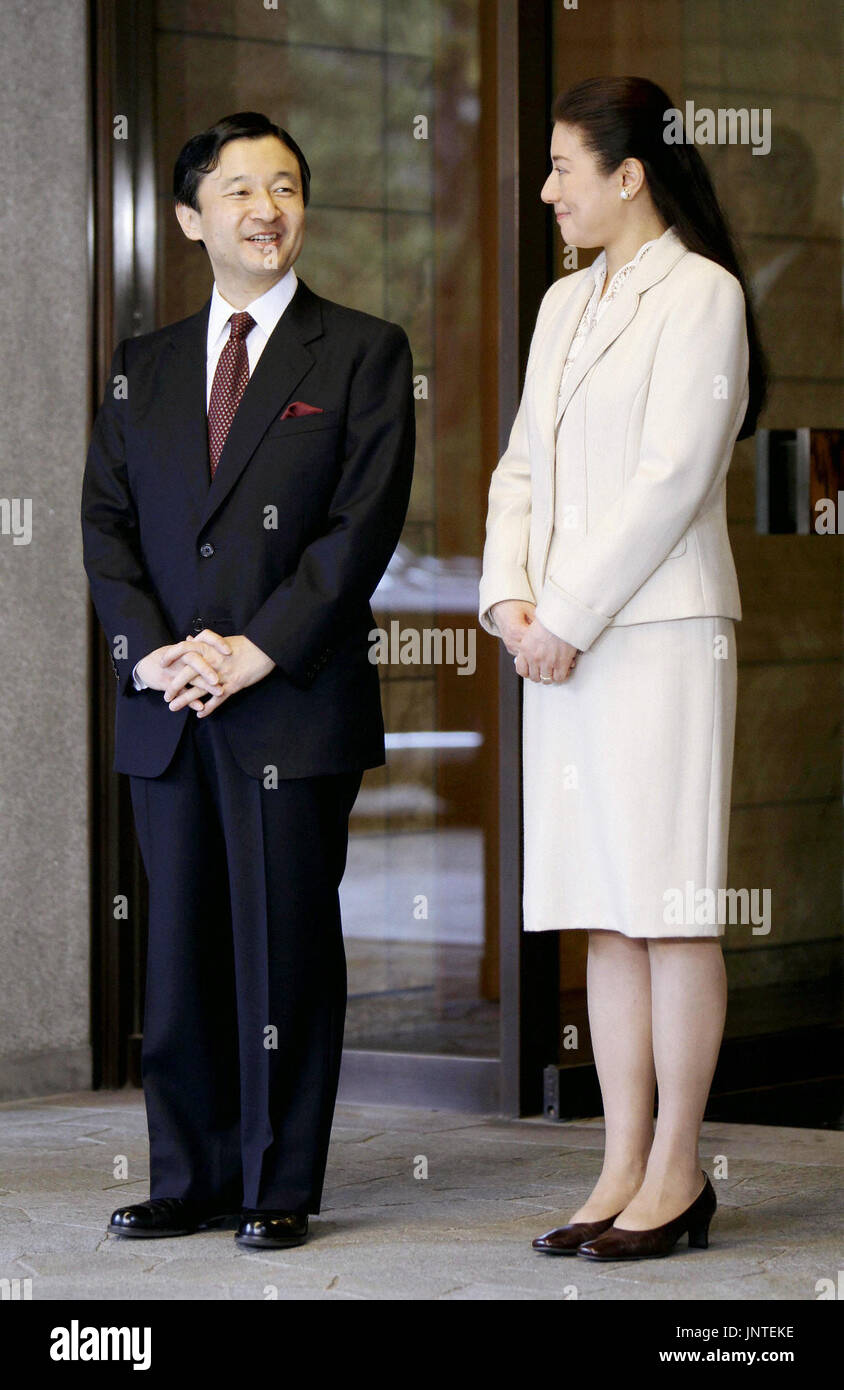 TOKYO, Japan - Crown Prince Naruhito and Crown Princess Masako talk at ...