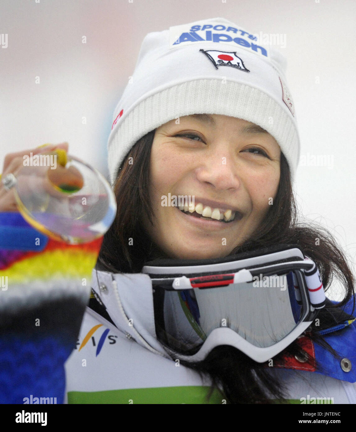 INAWASHIRO, Japan - Japan's Aiko Uemura shows off her medal after her ...