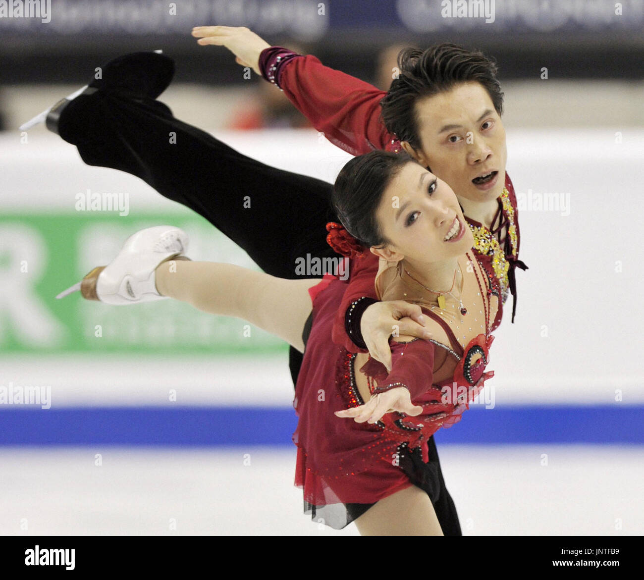 TURIN, Italy - China's Pang Qing (front) and Tong Jian perform during ...