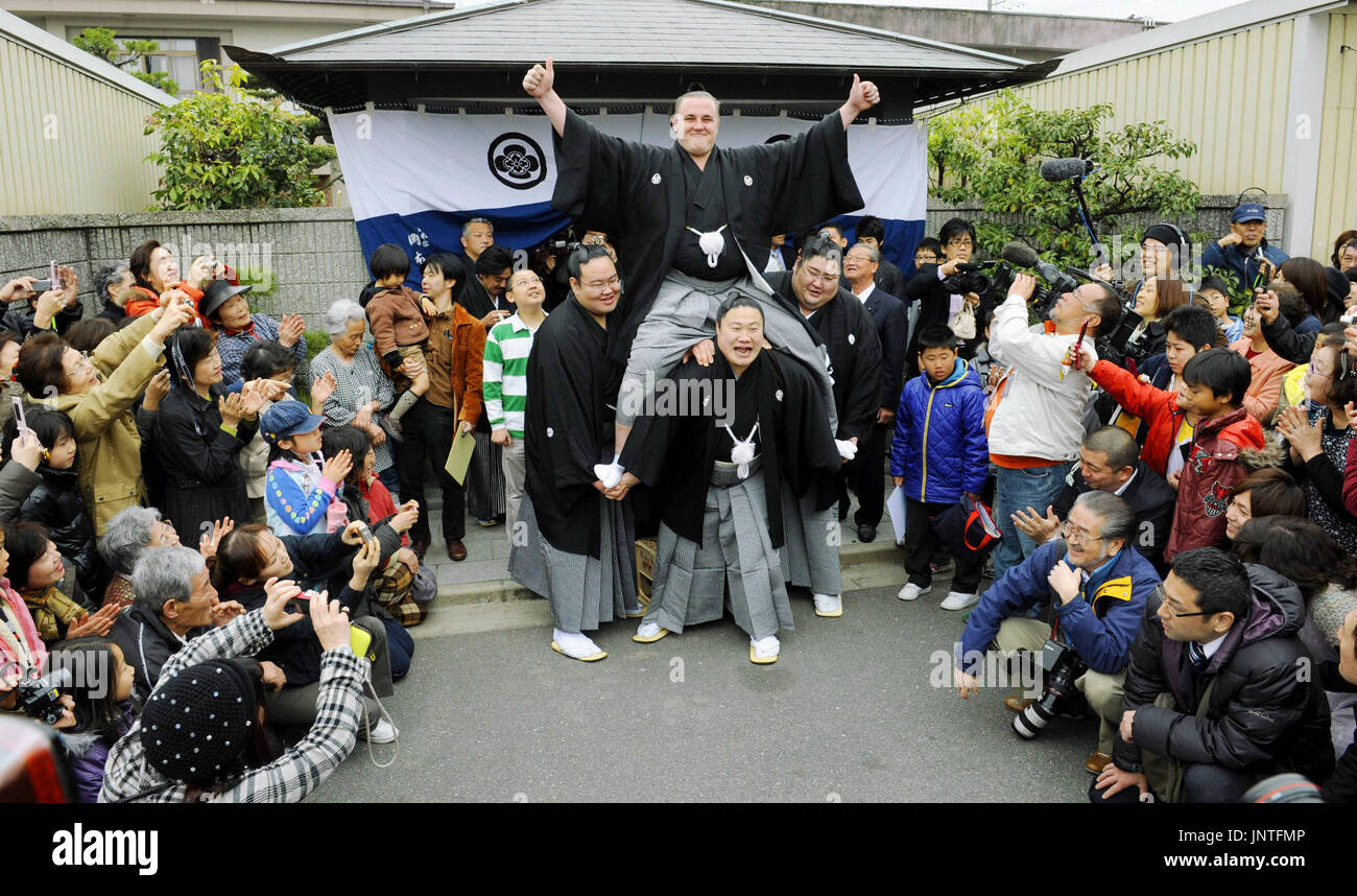 OSAKA, Japan - Estonian sumo wrestler Baruto, lifted by junior ...