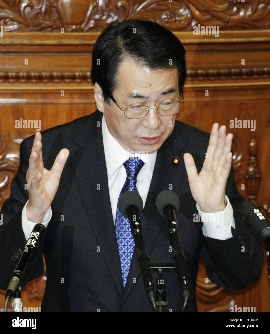 TOKYO, Japan - Japanese Prime Minister Naoto Kan answers questions ...