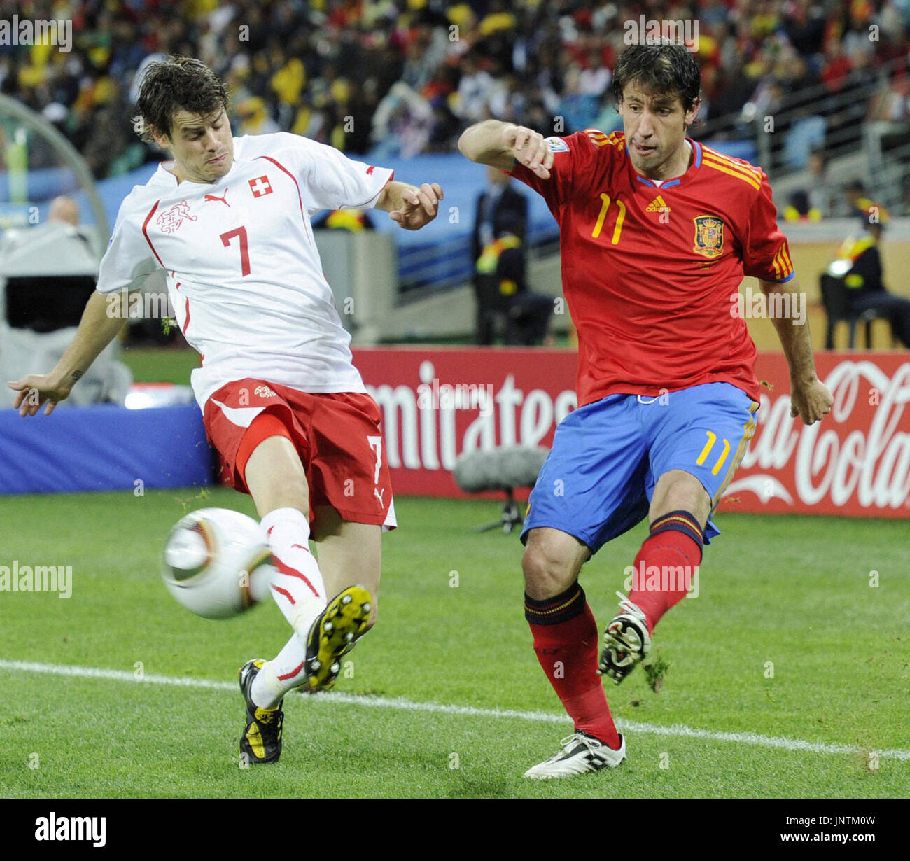 DURBAN, South Africa - Spain defender Joan Capdevila (R) passes the ...
