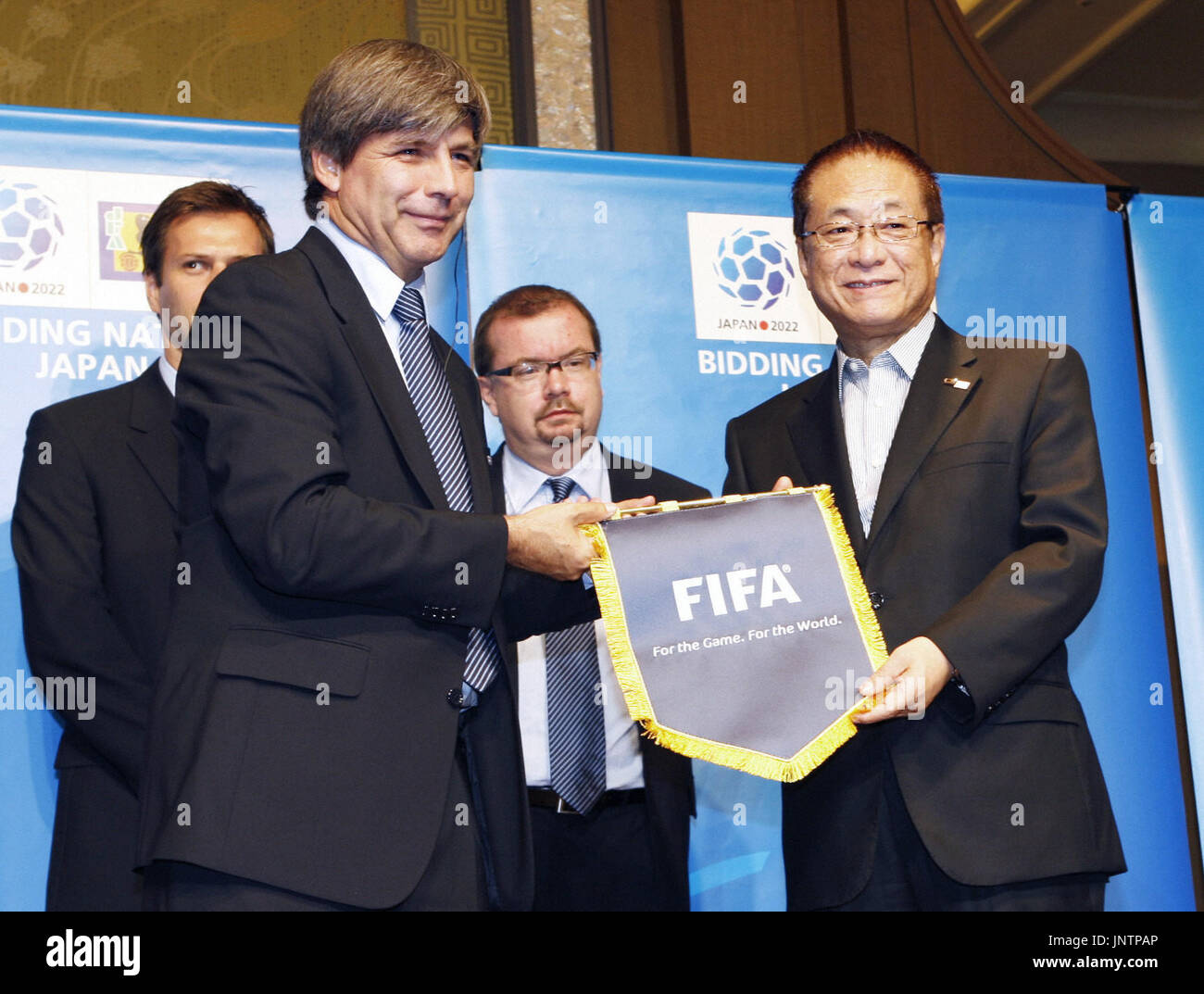 TOKYO, Japan - FIFA inspection team head Harold Mayne-Nicholls (L in ...
