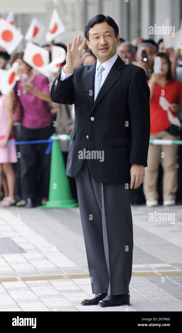 FUJINOMIYA, Japan - Japanese Crown Prince Naruhito waves as he arrives ...