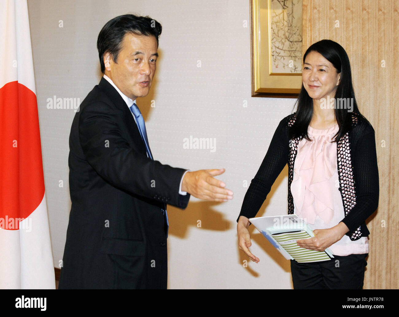 TOKYO, Japan - Actress Misako Konno (R), in her capacity as a U.N. Development Program goodwill ...
