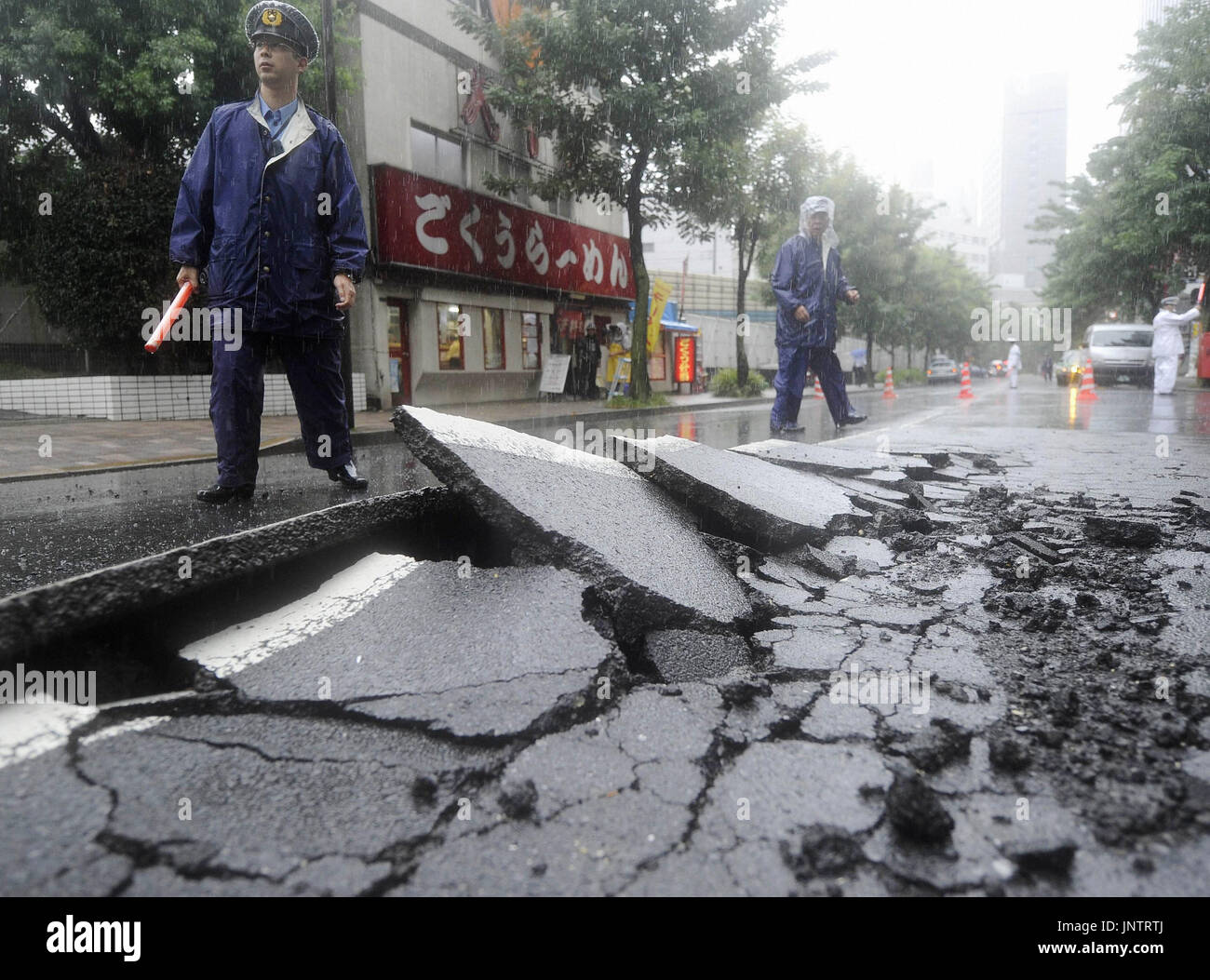 TOKYO, Japan - A road is seen damaged in Tokyo's Chiyoda area on Sept ...