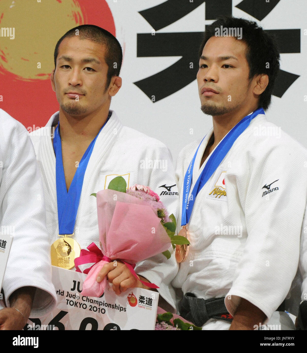 TOKYO, Japan - Japan's Hiroyuki Akimoto (L) and Yasuhiro Awano (R ...