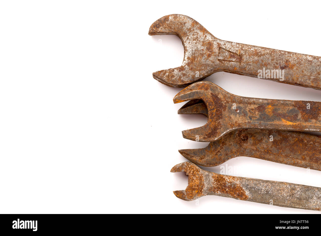 old rusty spanners isolated on white background Stock Photo - Alamy