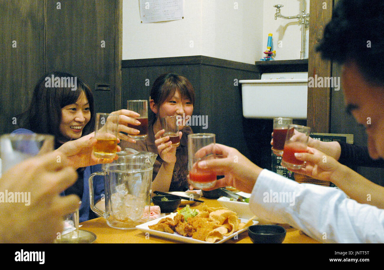 TOKYO, Japan - Customers drink in the ''science room'' at ''Koshitsu ...