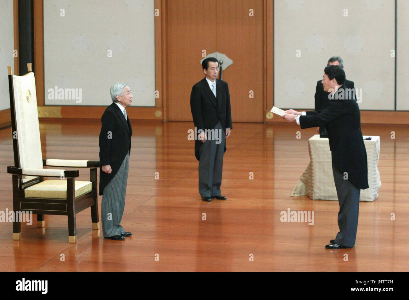 TOKYO, Japan - Banri Kaieda (R) receives a certificate for his new post of economic and fiscal ...