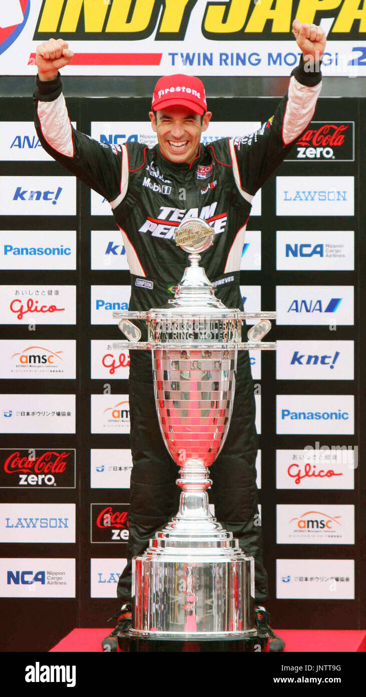 MOTEGI, Japan - Helio Castroneves of Brazil celebrates after winning ...