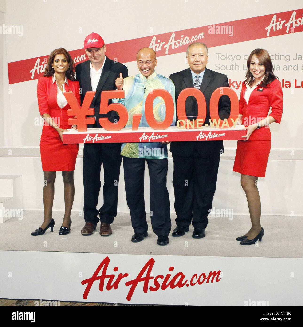 TOKYO, Japan - Azran Osman-Rani (C), chief executive officer of low ...