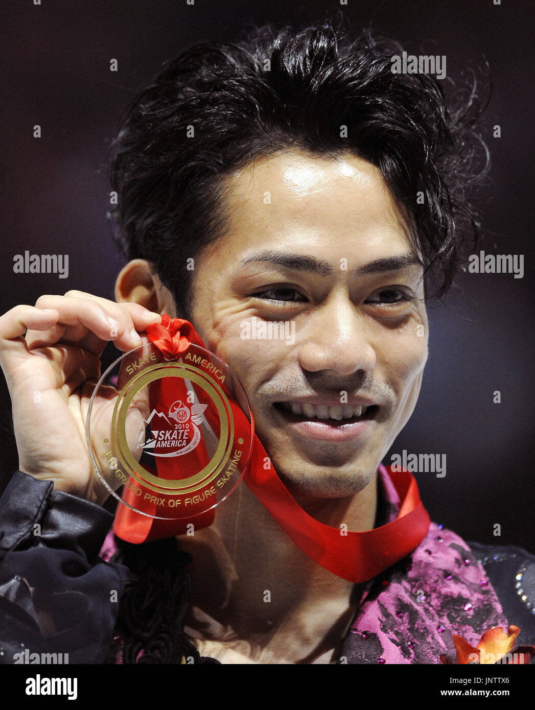 PORTLAND, United States - Japan's Daisuke Takahashi shows his medal on ...