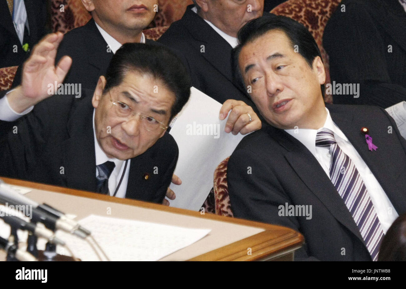 TOKYO, Japan - Japanese Chief Cabinet Secretary Yoshito Sengoku (L ...