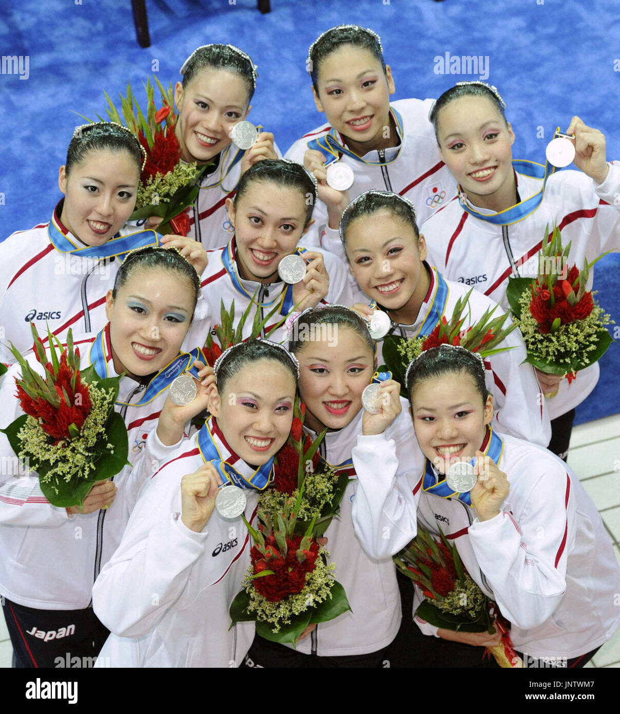 GUANGZHOU, China - Members of Japan's synchronized swimming team pose ...