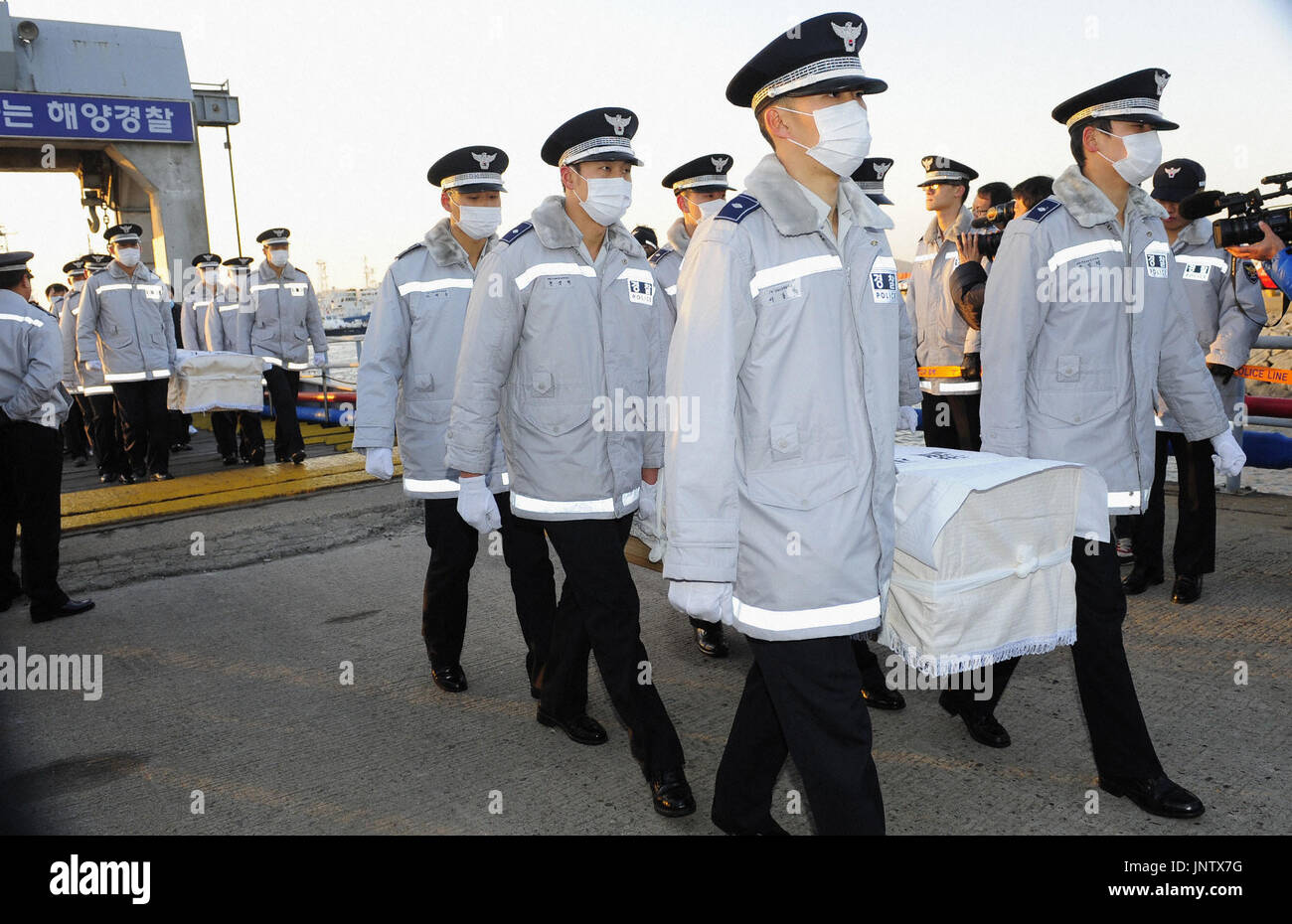 SEOUL, South Korea - Coffins containing the bodies of two civilian ...