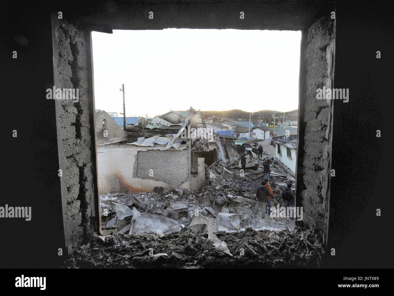 YEONPYEONG ISLAND, South Korea - Buildings are seen destroyed on ...