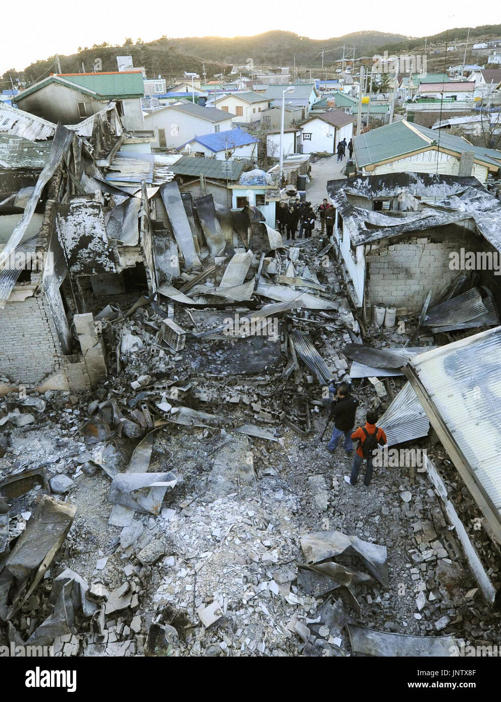 YEONPYEONG ISLAND, South Korea - Buildings are seen destroyed on ...
