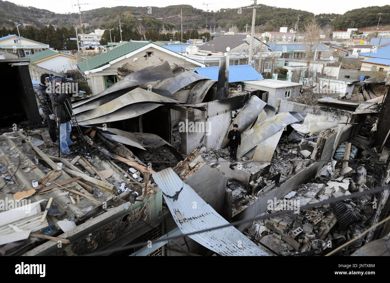 YEONPYEONG ISLAND, South Korea - Buildings are seen destroyed on ...