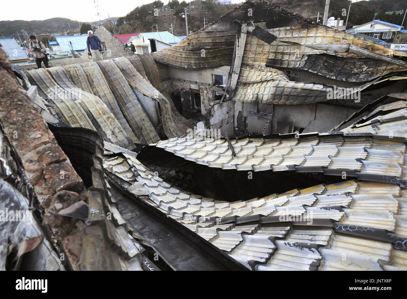 YEONPYEONG ISLAND, South Korea - Buildings are seen destroyed on ...