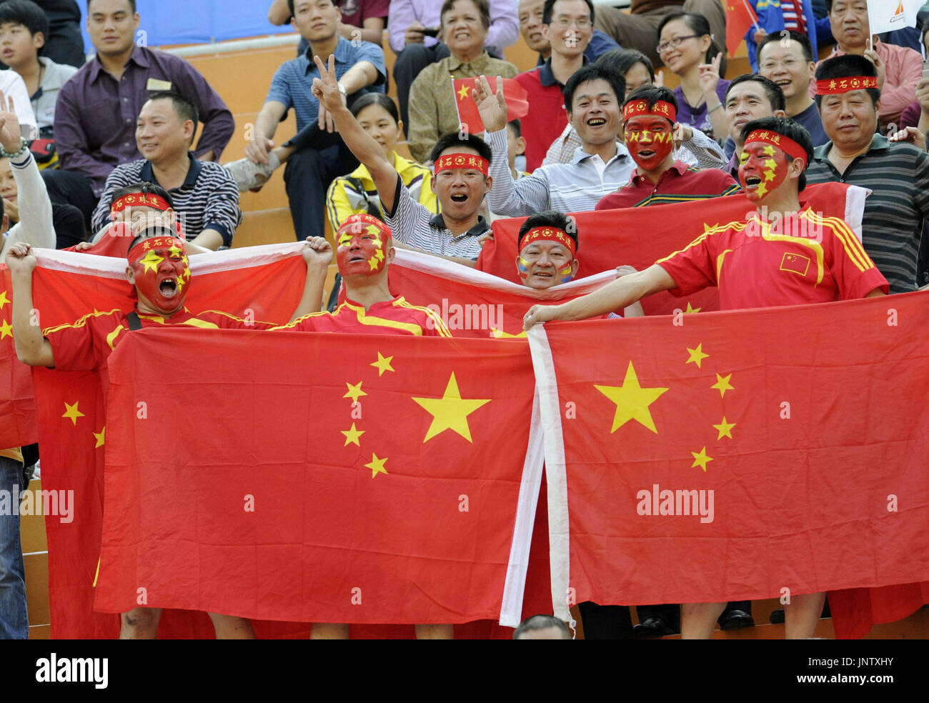 GUANGZHOU, China - Chinese supporters cheer for the Chinese women's ...