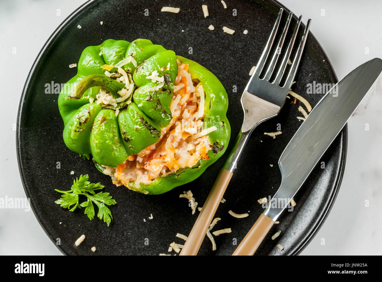 Autumn recipes. Homemade stuffed bell pepper with minced meat, carrots ...