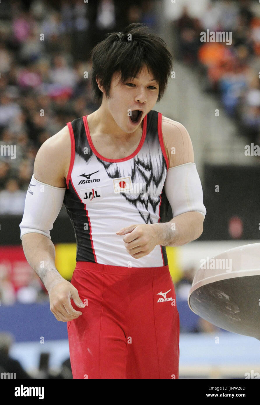 ROTTERDAM, Netherlands - Kohei Uchimura reacts after the parallel bars ...