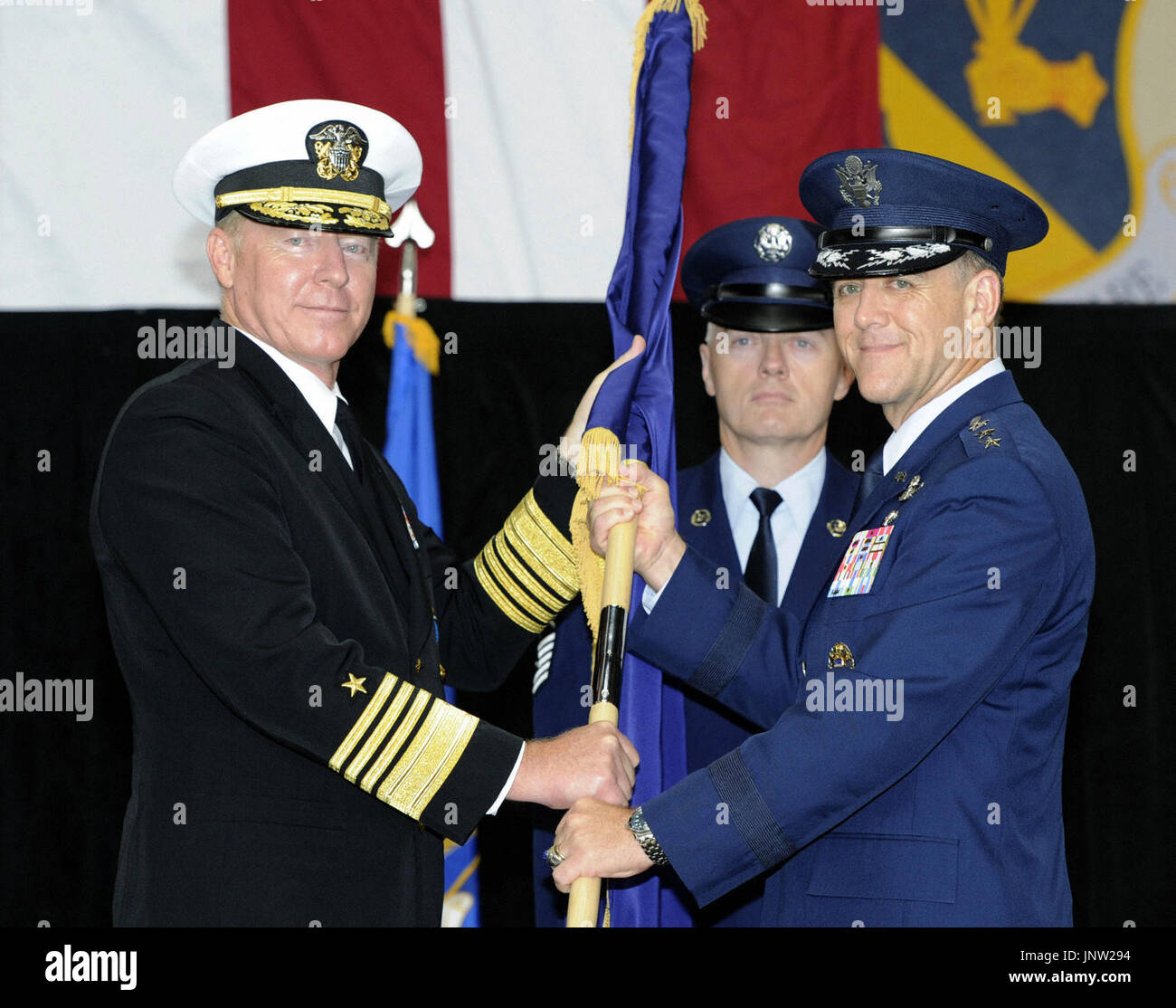 TOKYO, Japan - Lt. Gen. Burton Field (R) receives a flag of the U.S ...