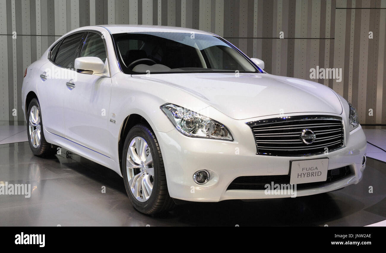 TOKYO, Japan - A hybrid version of the Fuga luxury sedan is shown to ...