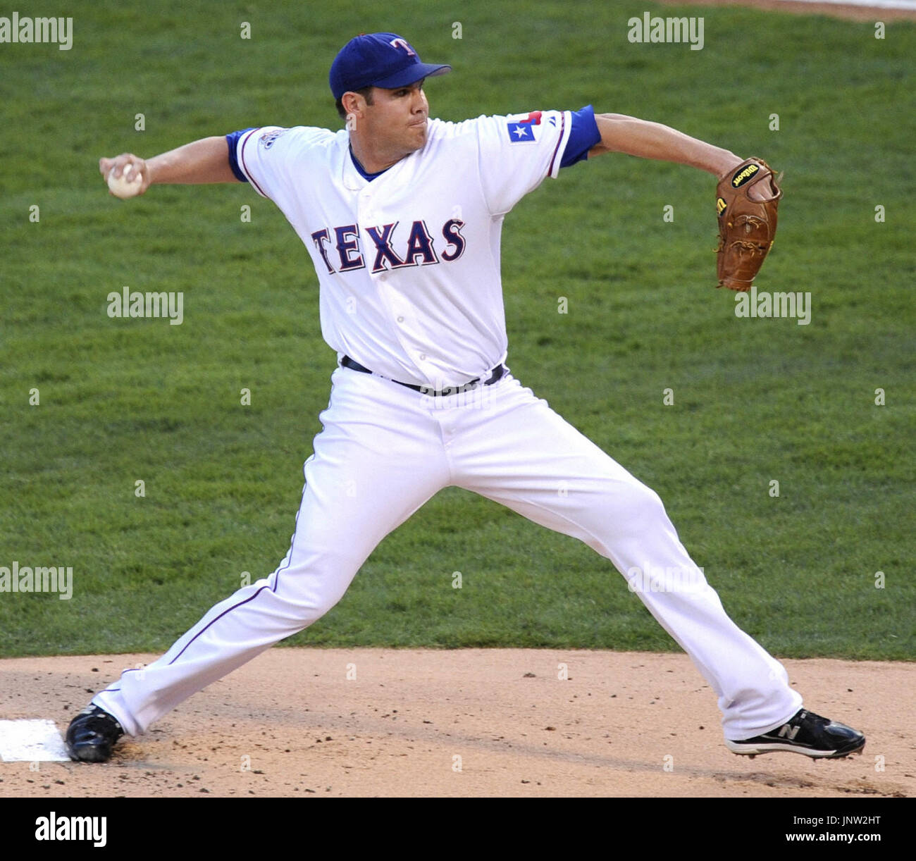 ARLINGTON, United States - Texas Rangers pitcher Colby Lewis starts ...