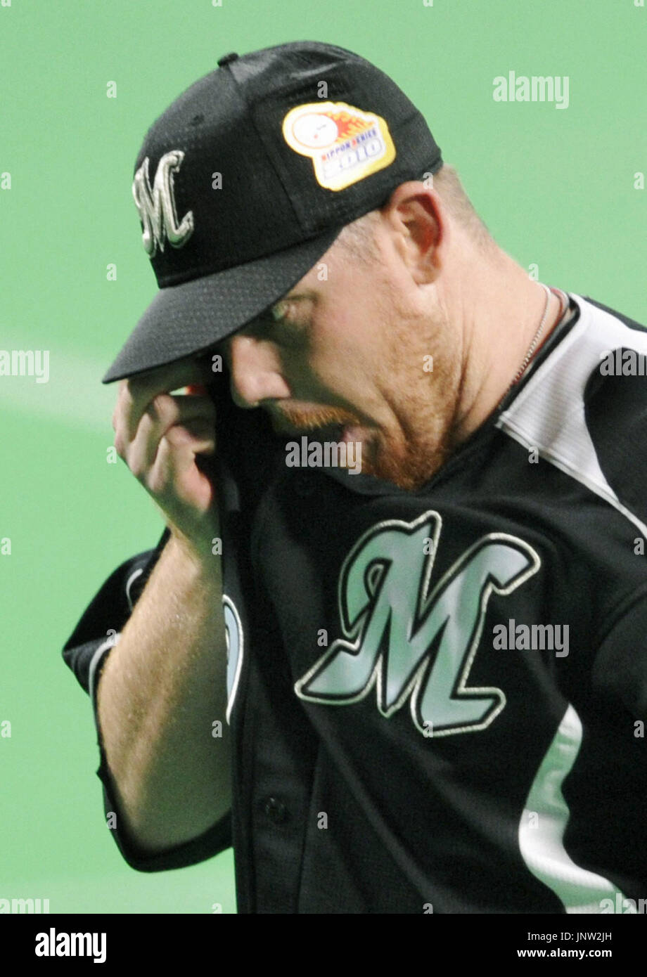 NAGOYA, Japan - Lotte Marines starter Bill Murphy returns to the dugout ...