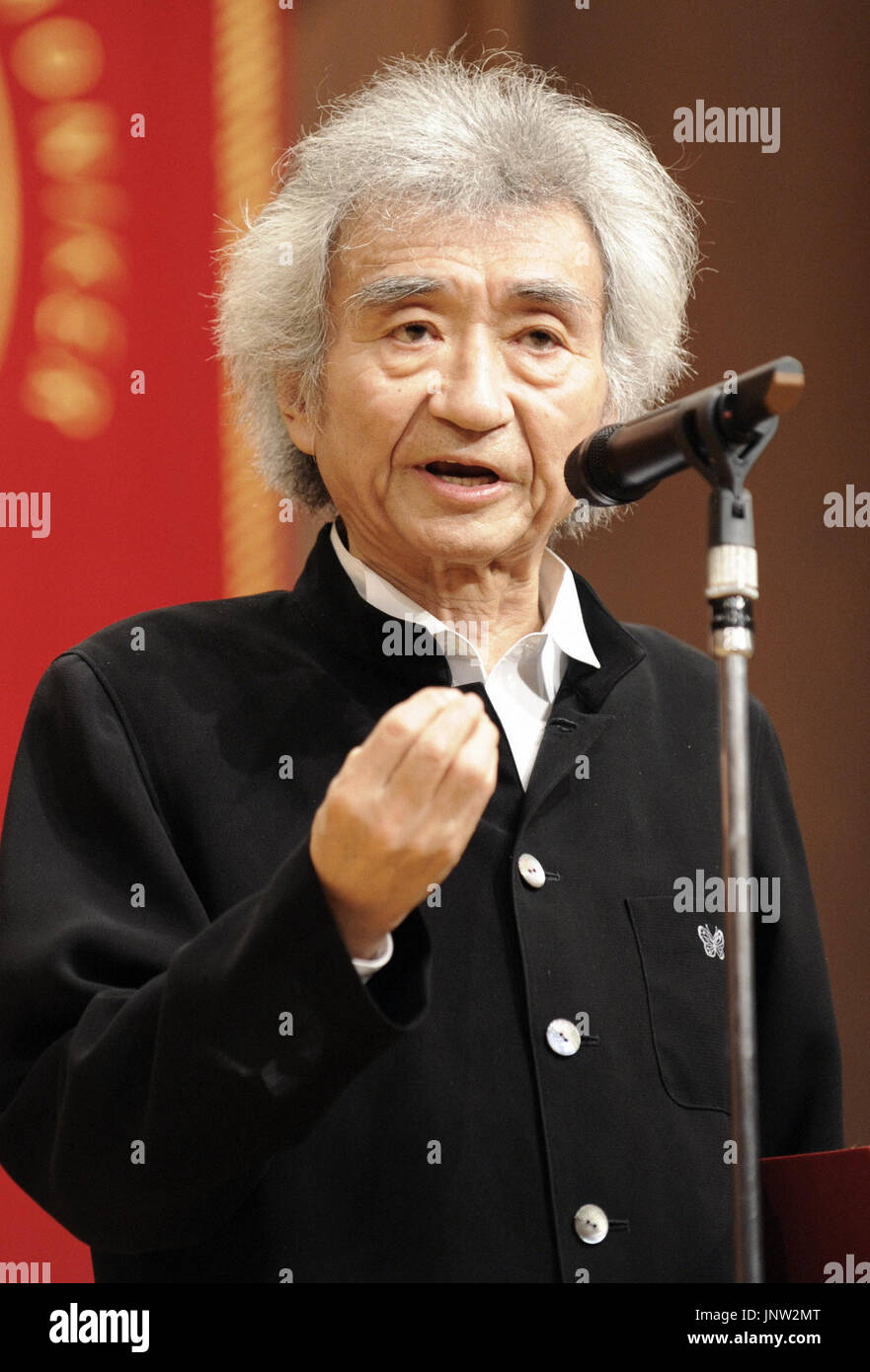 TOKYO, Japan - Conductor Seiji Ozawa speaks after receiving a ...