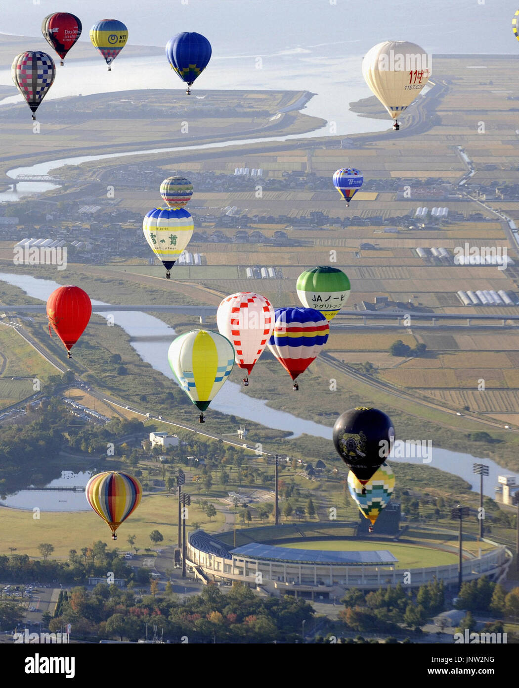 SAGA, Japan - Hot air balloons head skyward from near the Kase River ...