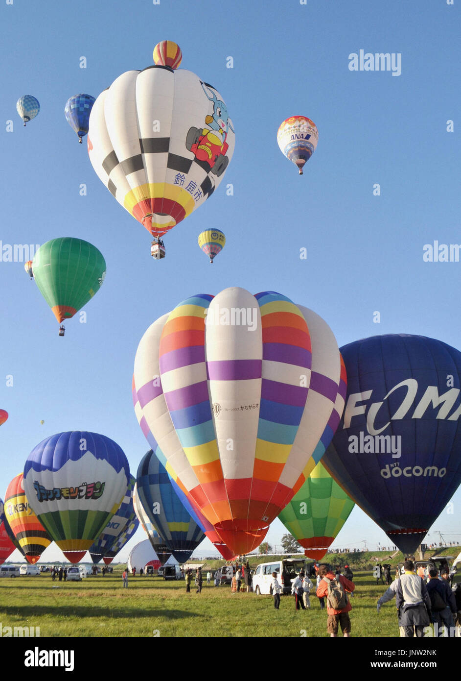 SAGA, Japan - Hot air balloons head skyward from near the Kase River ...