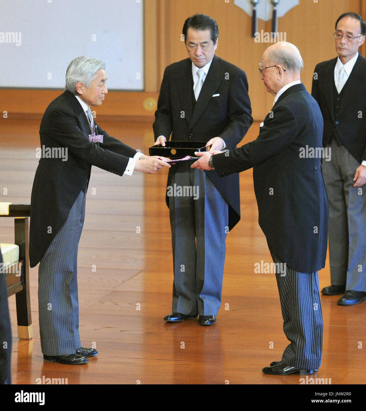 TOKYO, Japan - Hokkaido University professor emeritus Akira Suzuki (R ...