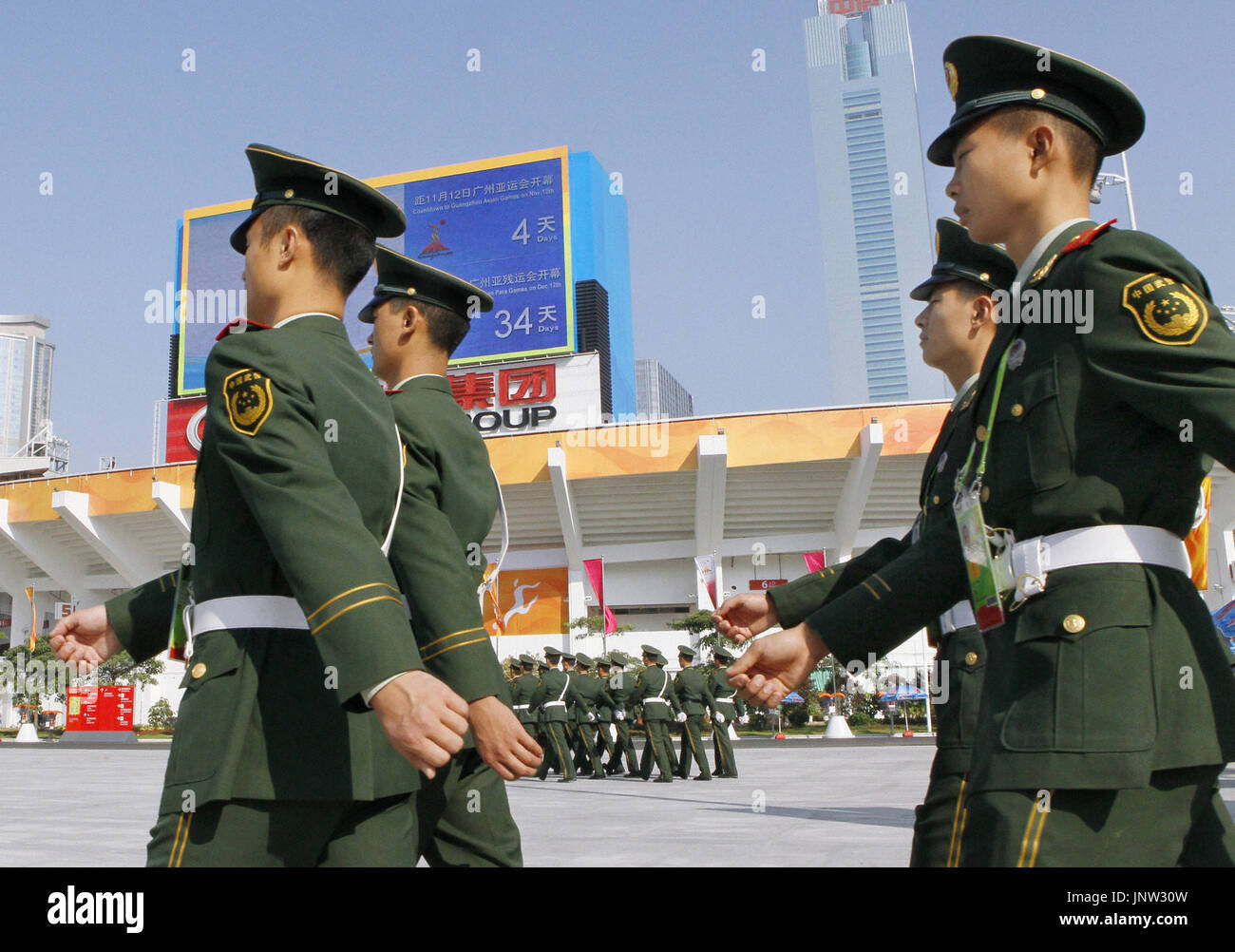 GUANGZHOU, China - Armed police officers patrol in front of Tianhe ...